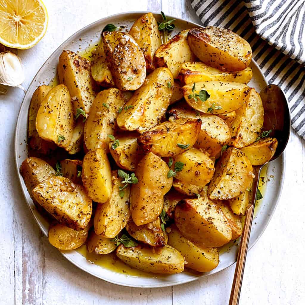 Greek Lemon Potatoes with Garlic & Oregano - The Greek Foodie