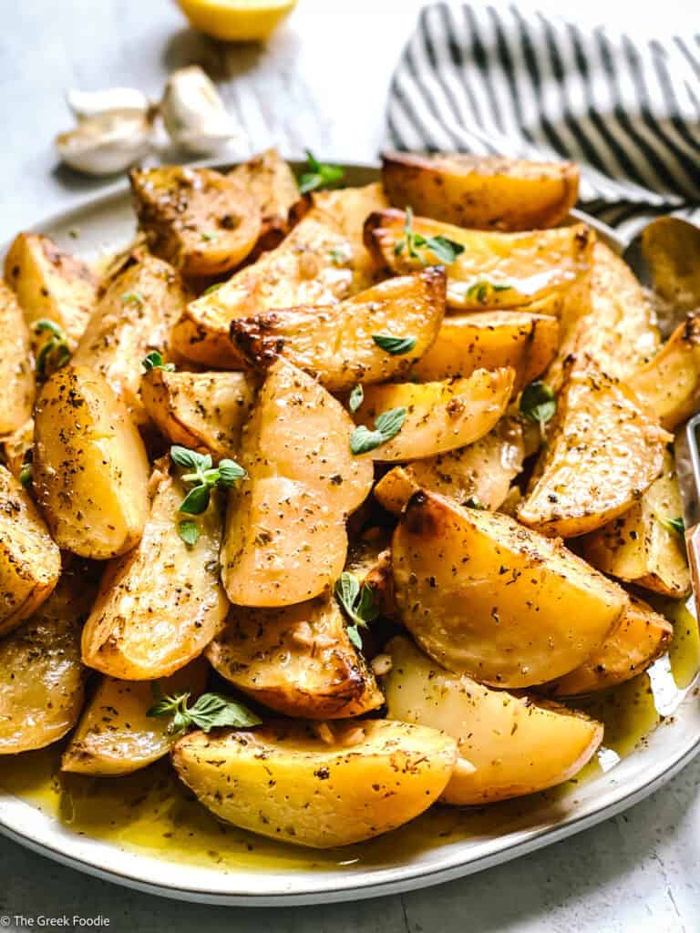 Greek Lemon Potatoes with Garlic & Oregano - The Greek Foodie